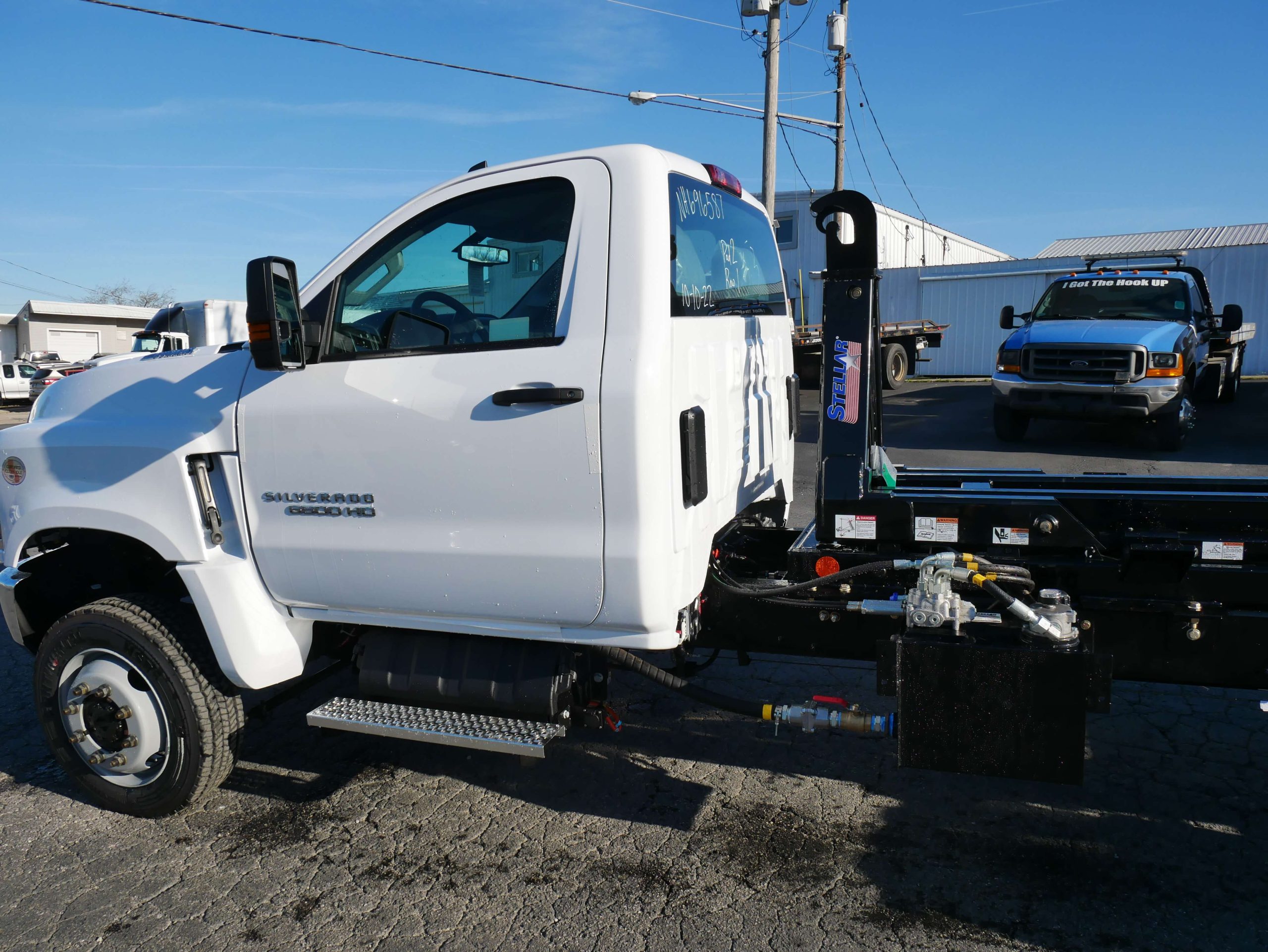 2022 Chevrolet - Stellar Flex 120-14 Hooklift - Tipton Tow Trucks